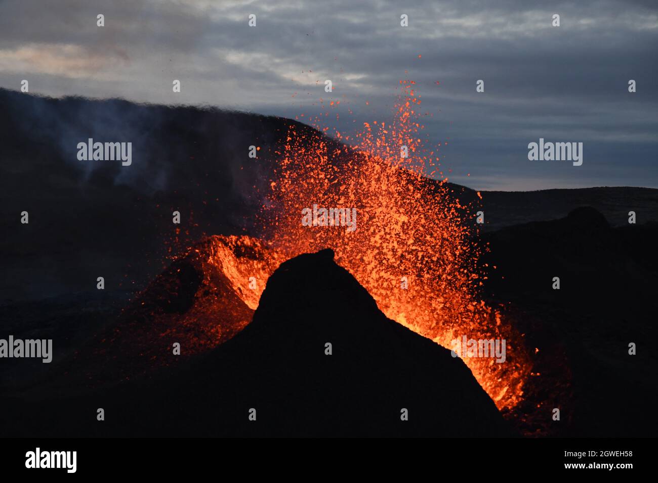 Eruption at Fagradalsfjall, Iceland. Volcanic vent with orange and red ...