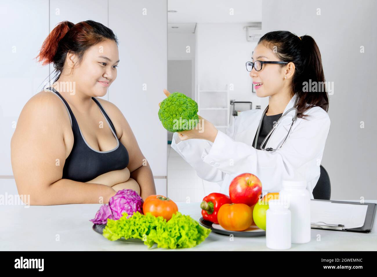 Overweight patient with doctor hi-res stock photography and images - Alamy