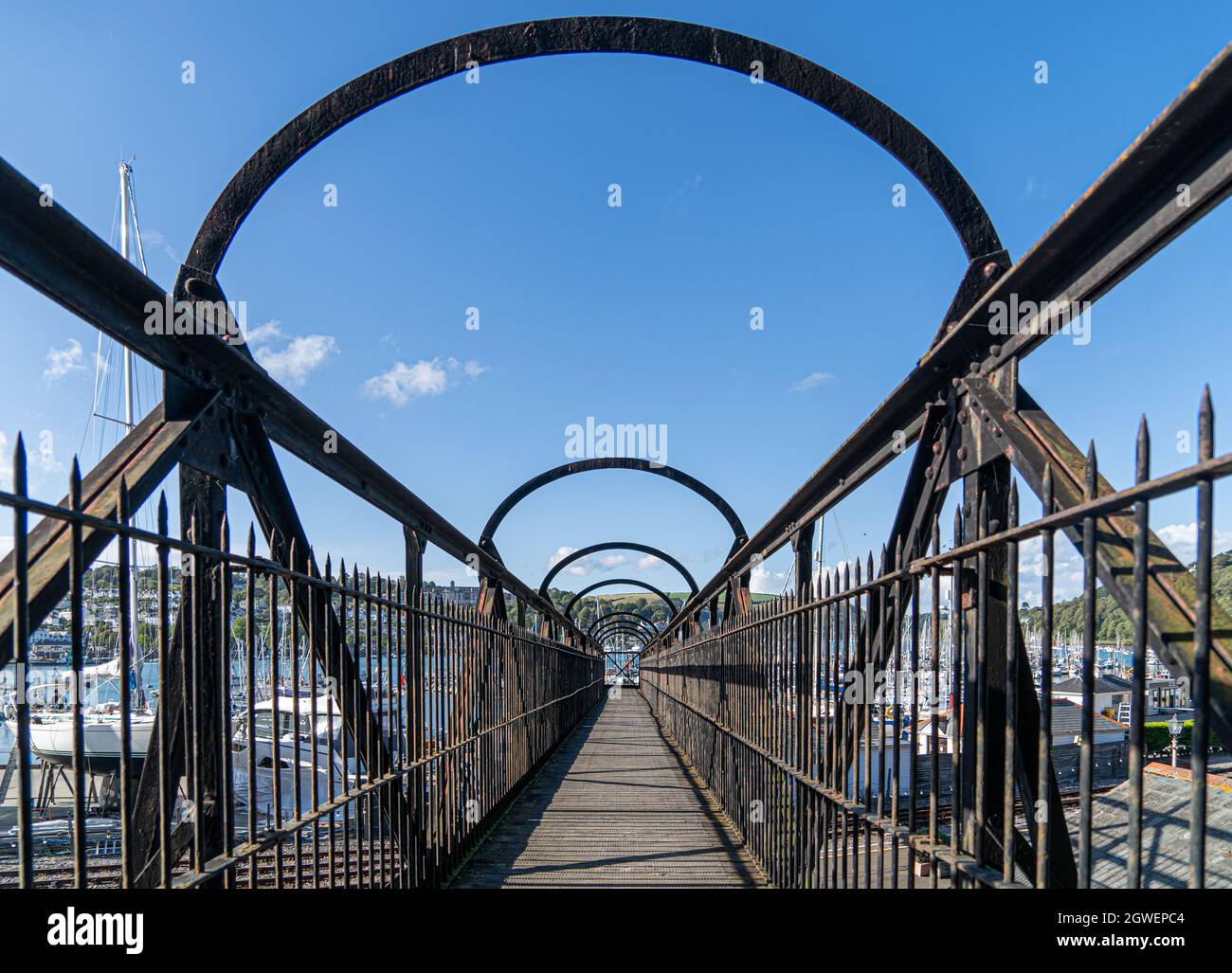 old wooden and iron pedestrian bridge over steam railway tracks in ...