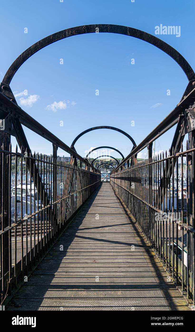 old wooden and iron pedestrian bridge over steam railway tracks in ...
