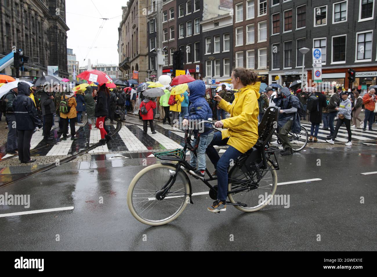 Amsterdam, Netherlands. 03rd Oct, 2021. A woman ride bicycle take ...