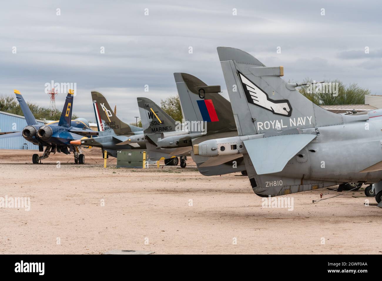 A line of Harrier attack aircraft tails in the Pima Air & Space Museum ...