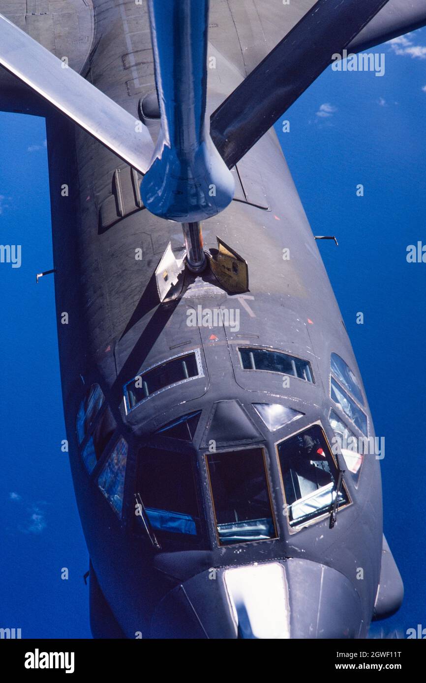 Aerial refueling of a U.S. Air Force B-52 bomber by a KC-135 tanker ...