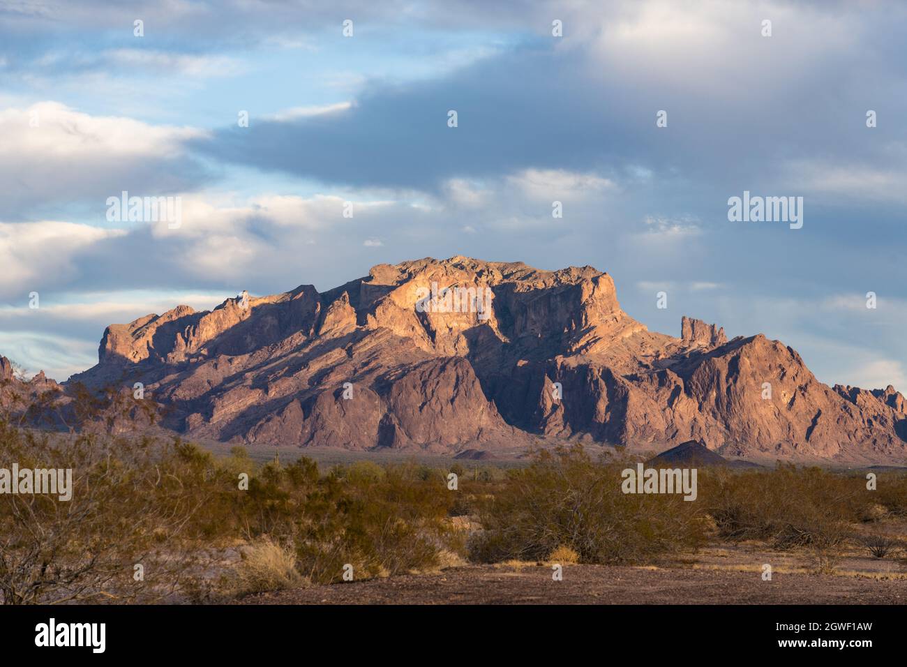 The Kofa Mountains at sunset in the Kofa National Wildlife Reserve in ...