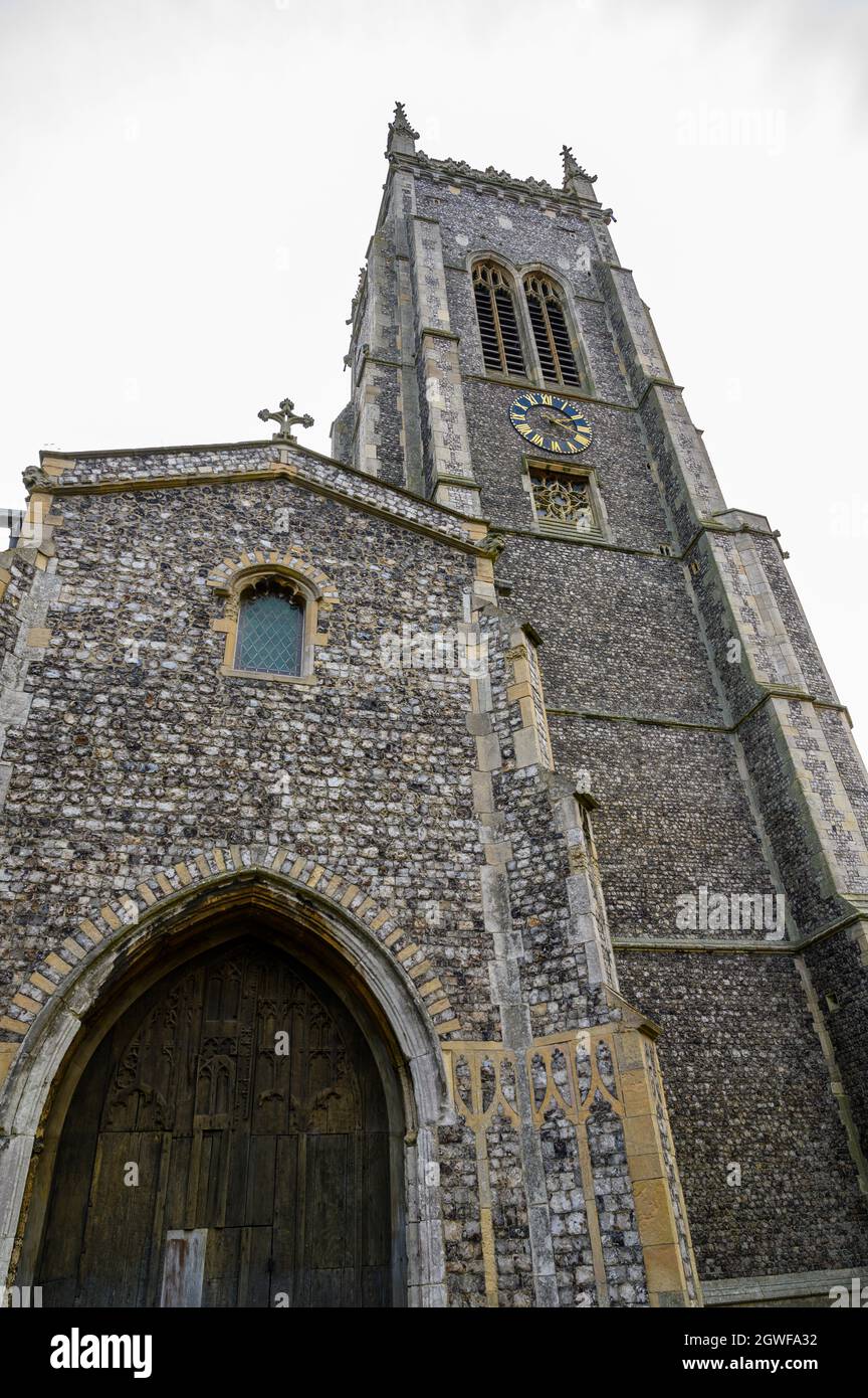 Entrance and flint front facade with clock tower of Cromer Parish ...
