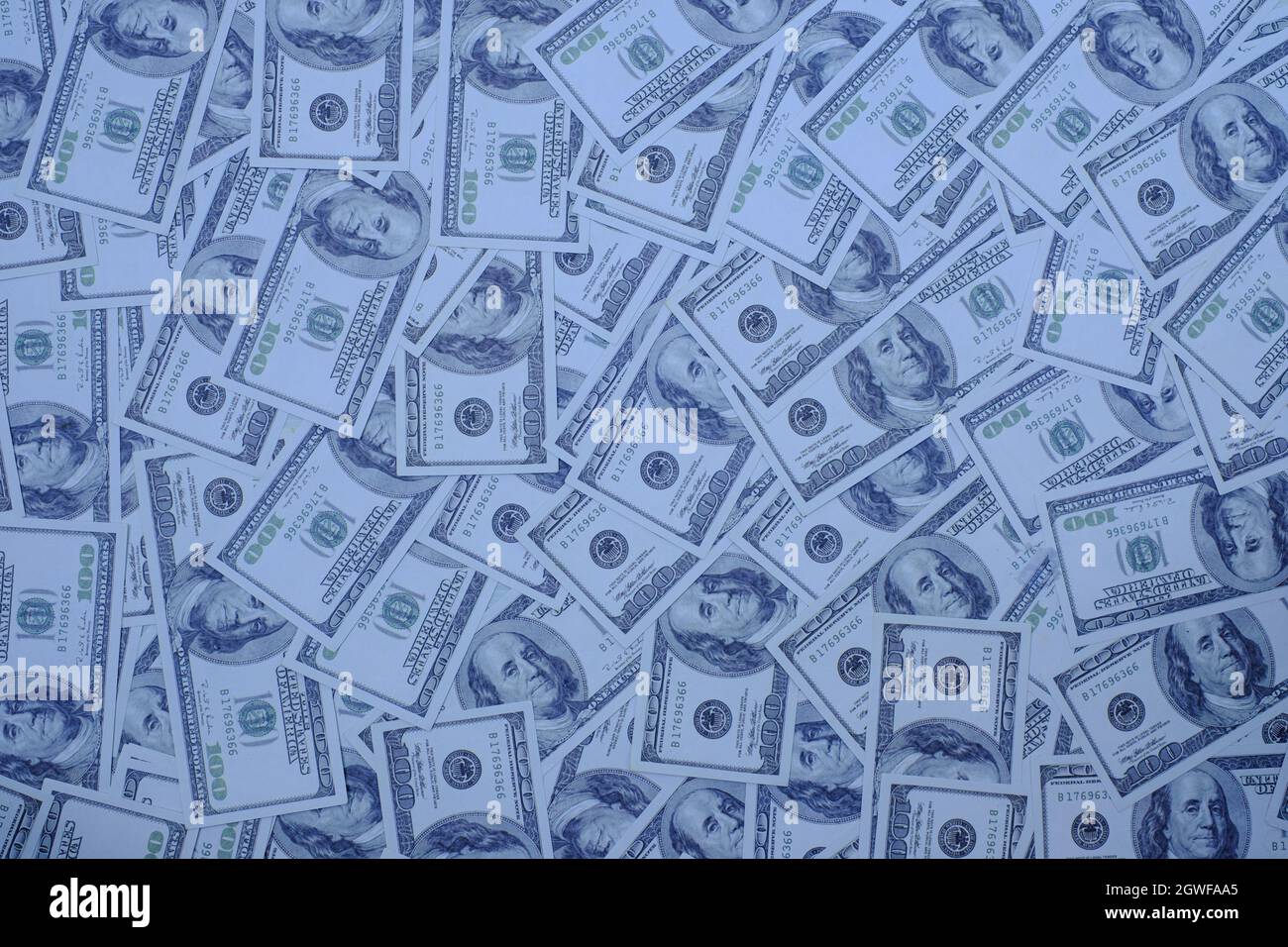 Group of money stack of 100 US dollars banknotes a lot of the ...
