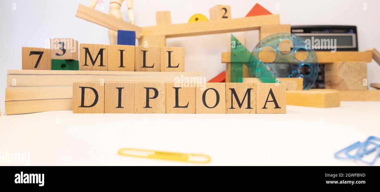 The word diploma mill was created from wooden cubes. Education and ...