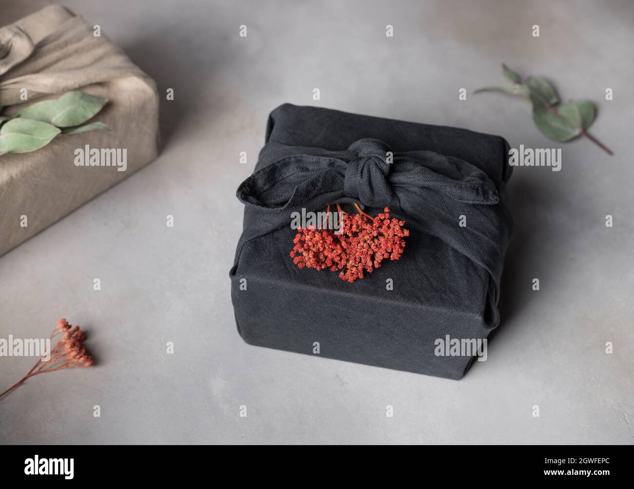 Present wrapped in fabric hi-res stock photography and images - Alamy