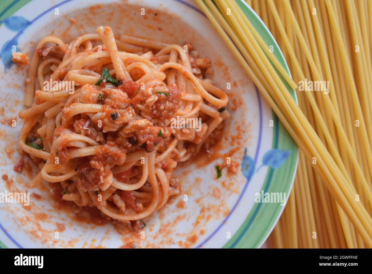 spaghetti with fish ragu a typical italian recipe Stock Photo - Alamy