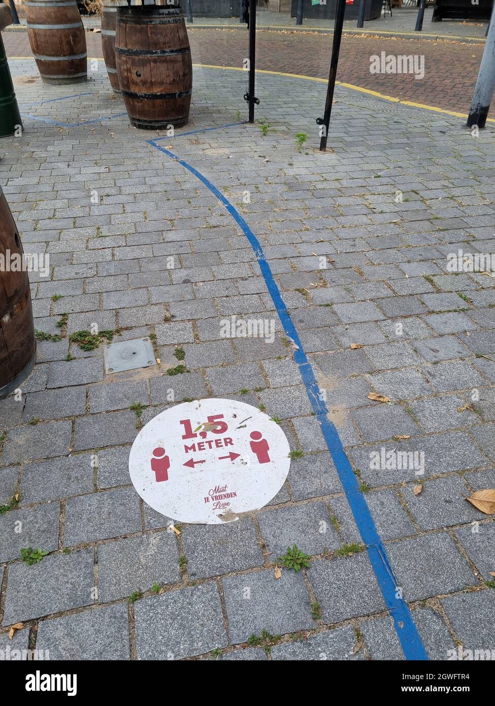 Worn out social distancing signage at a terrace in Rotterdam Stock ...