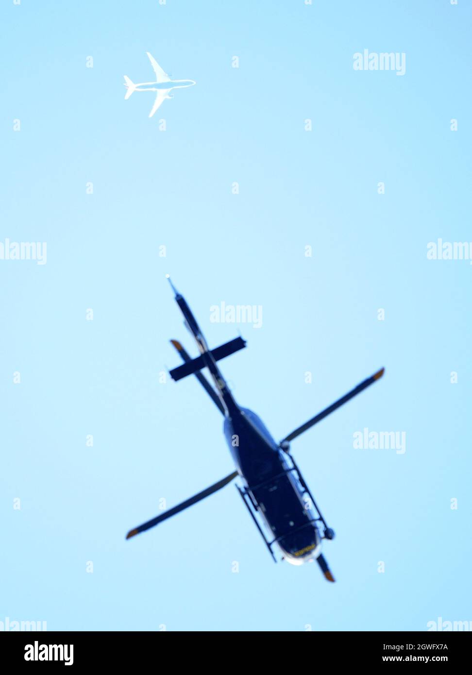 A view of a helicopter and an aeroplane overhead before the Premier ...