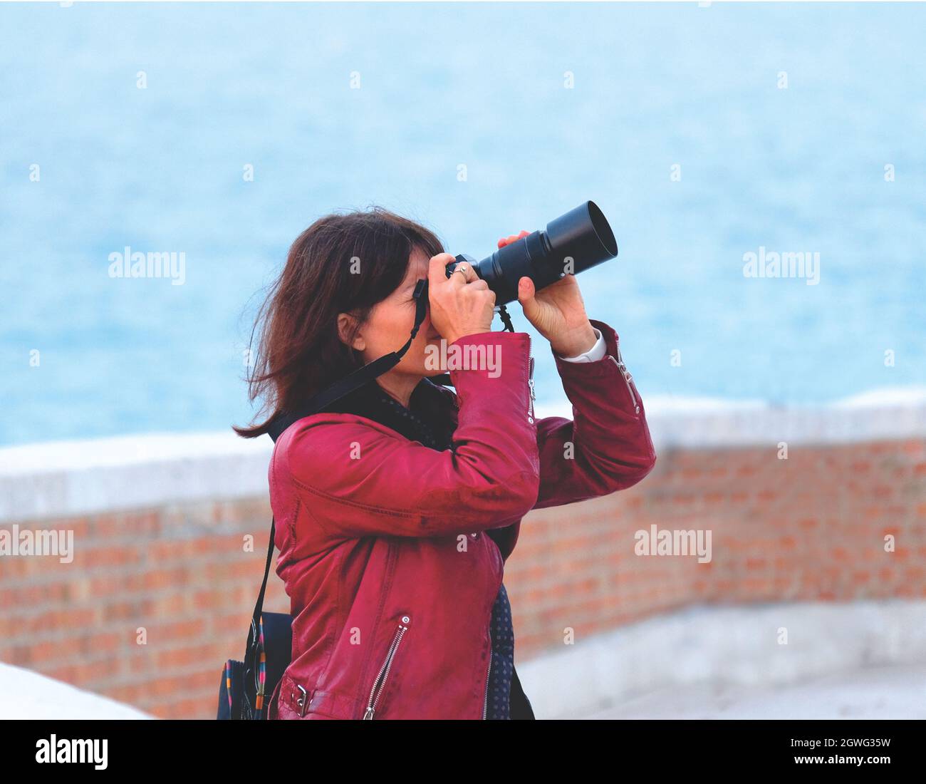 Person looking thru binoculars hi-res stock photography and images - Alamy