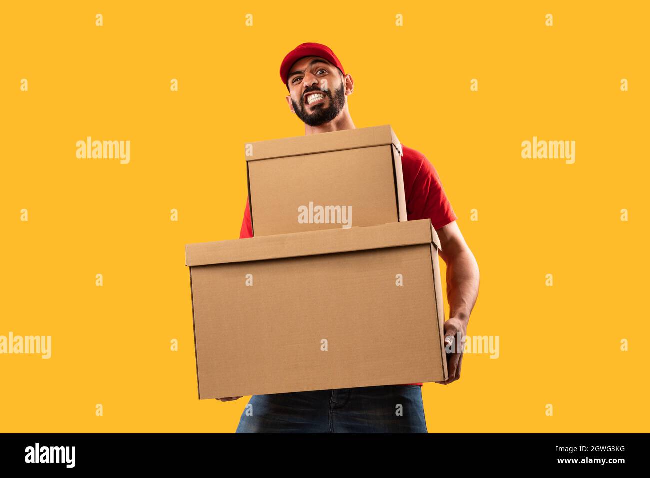 Funny Arab Courier Guy Holding Stack Of Heavy Cardboard Boxes ...