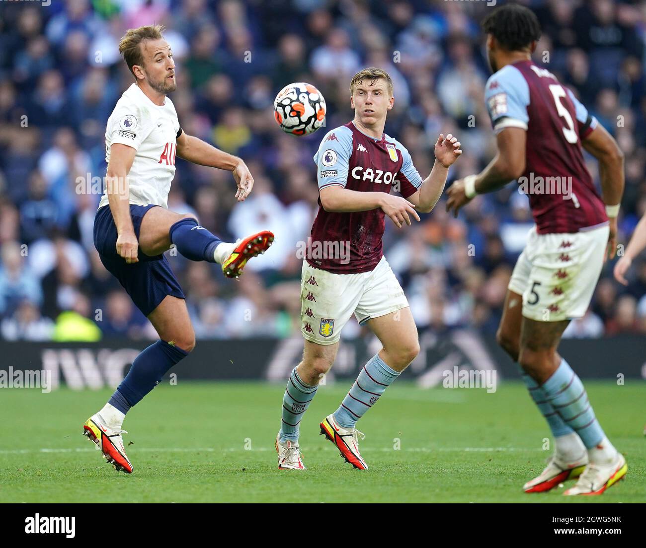 Tottenham Hotspur's Harry Kane (left) controls the ball as Aston Villa ...