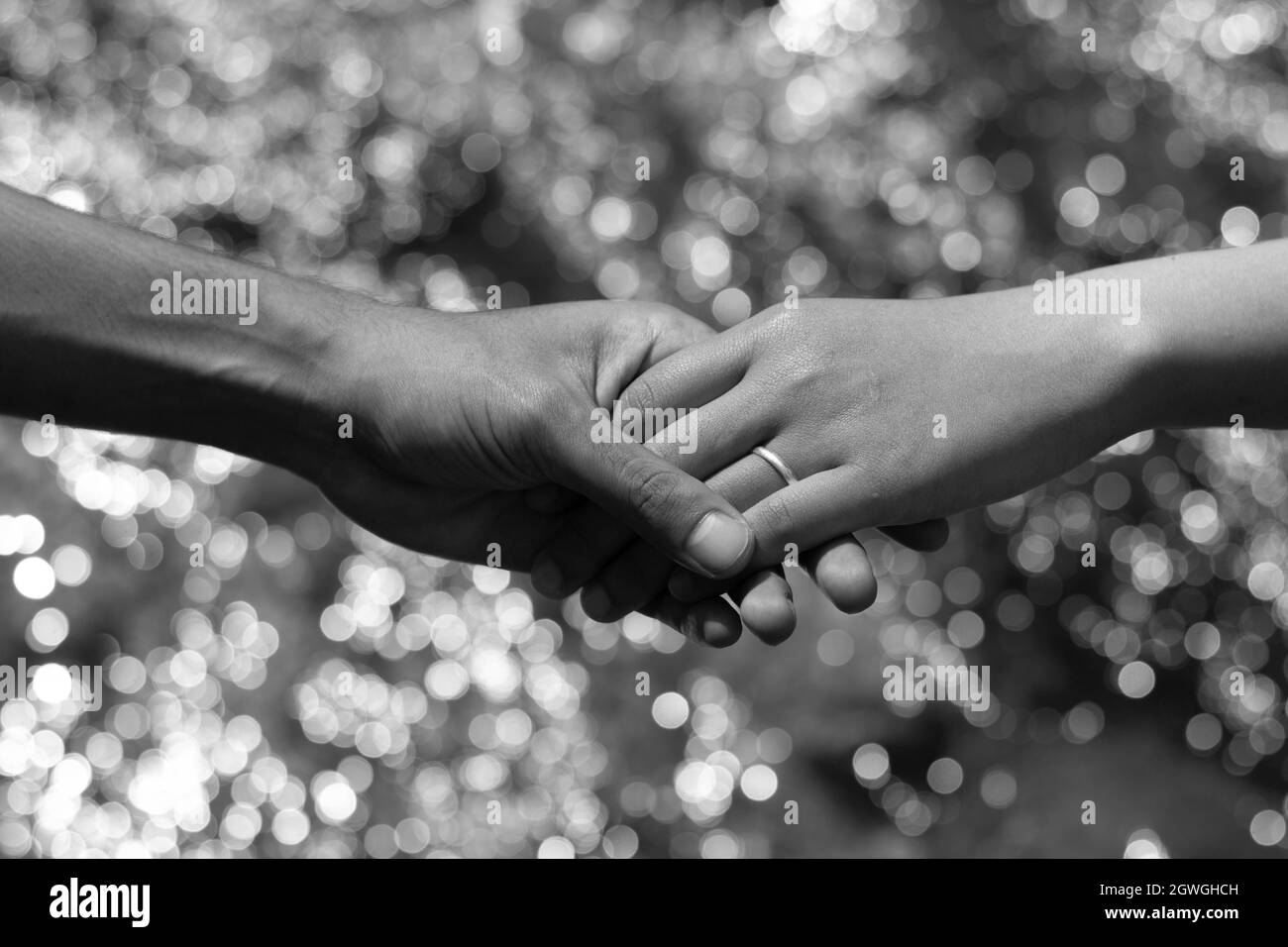Two hands touching black and white Black and White Stock Photos ...