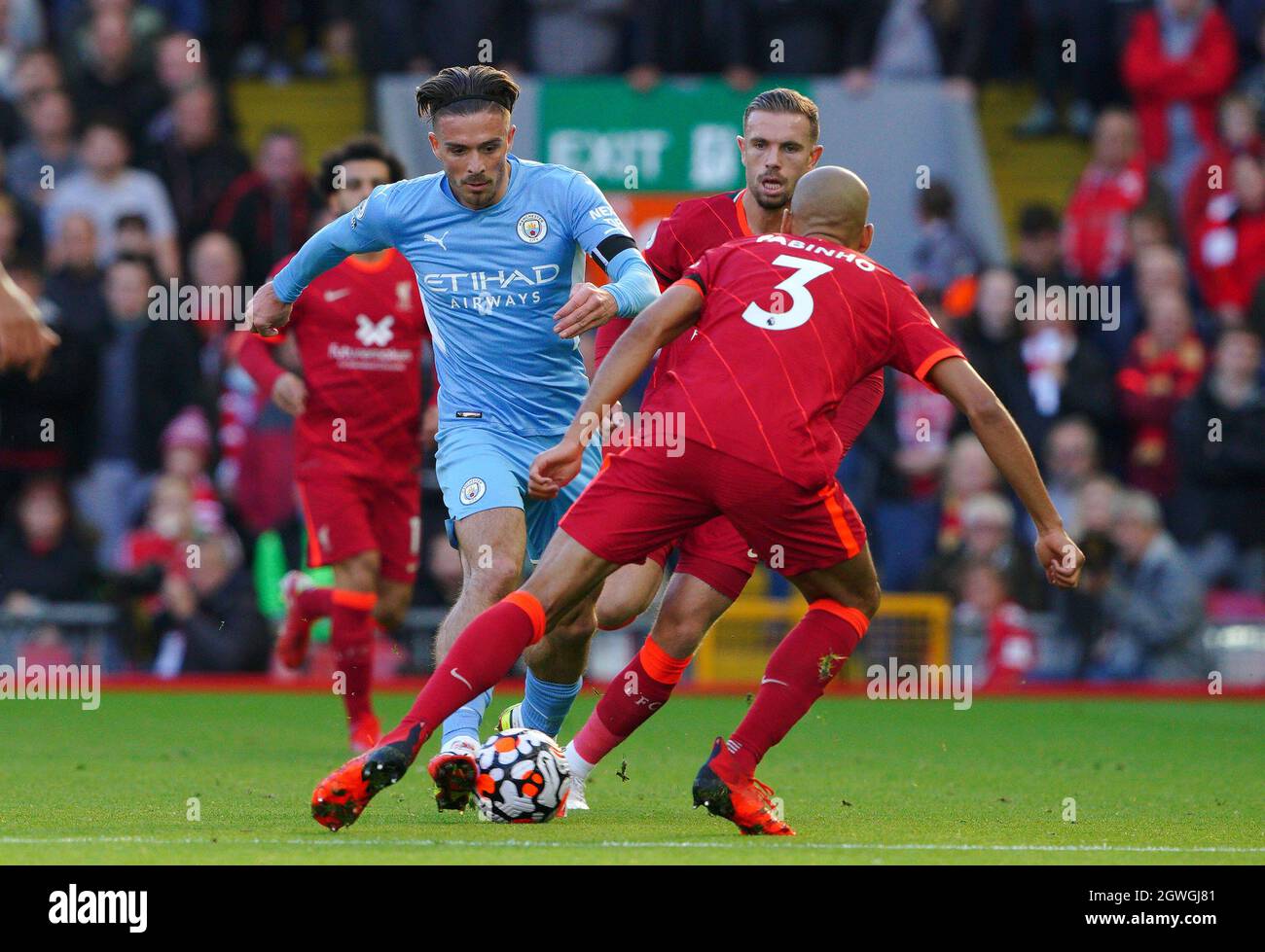 Manchester City's Jack Grealish (left) and Liverpool's Fabinho in ...