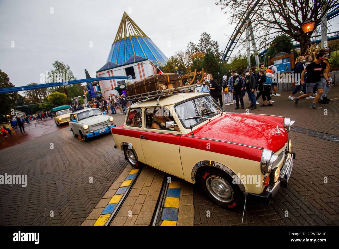 Rust, Germany. 03rd Oct, 2021. Trabant cars drive through Europa-Park ...