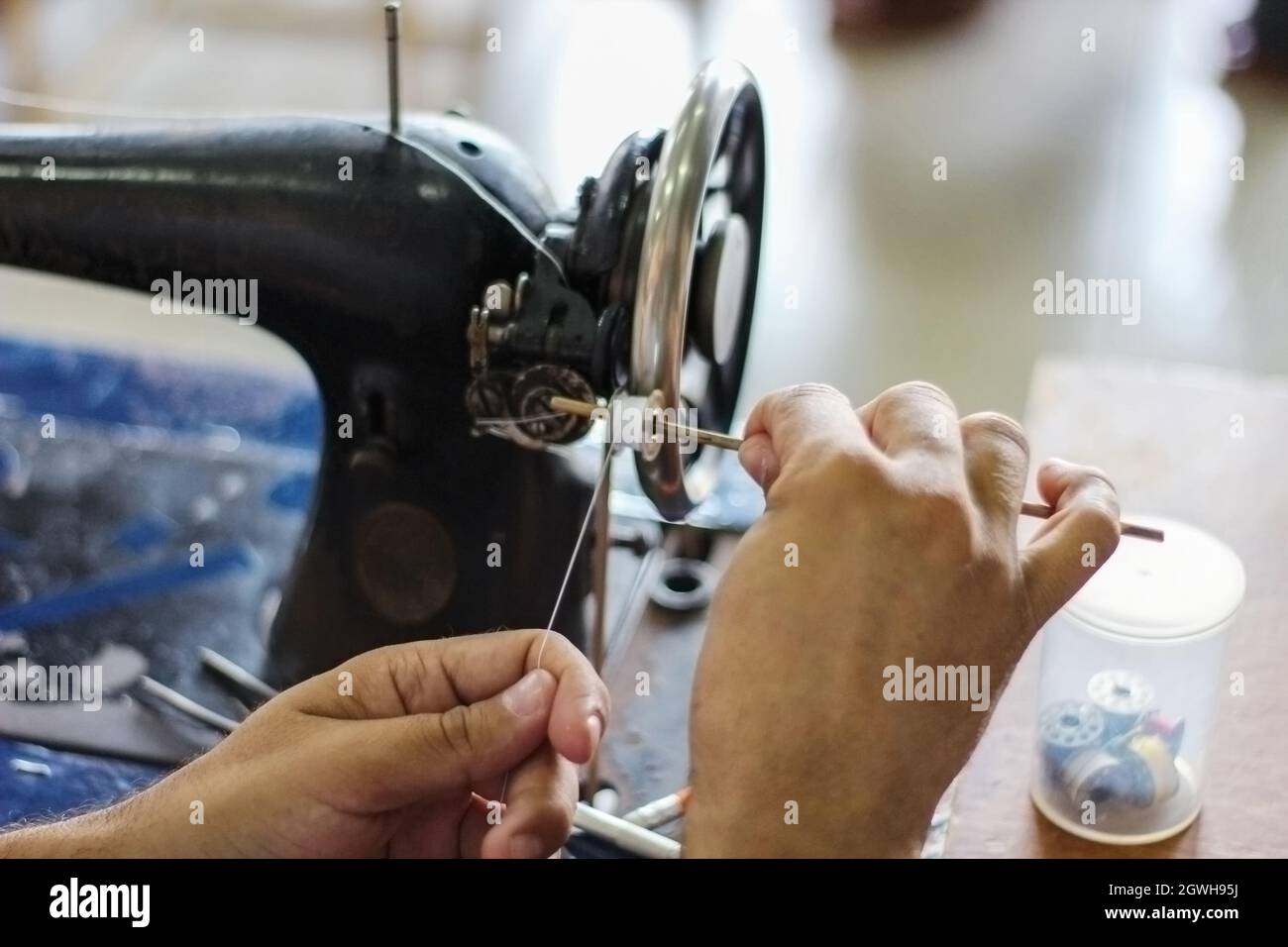 Operating a sewing machine hi-res stock photography and images - Alamy