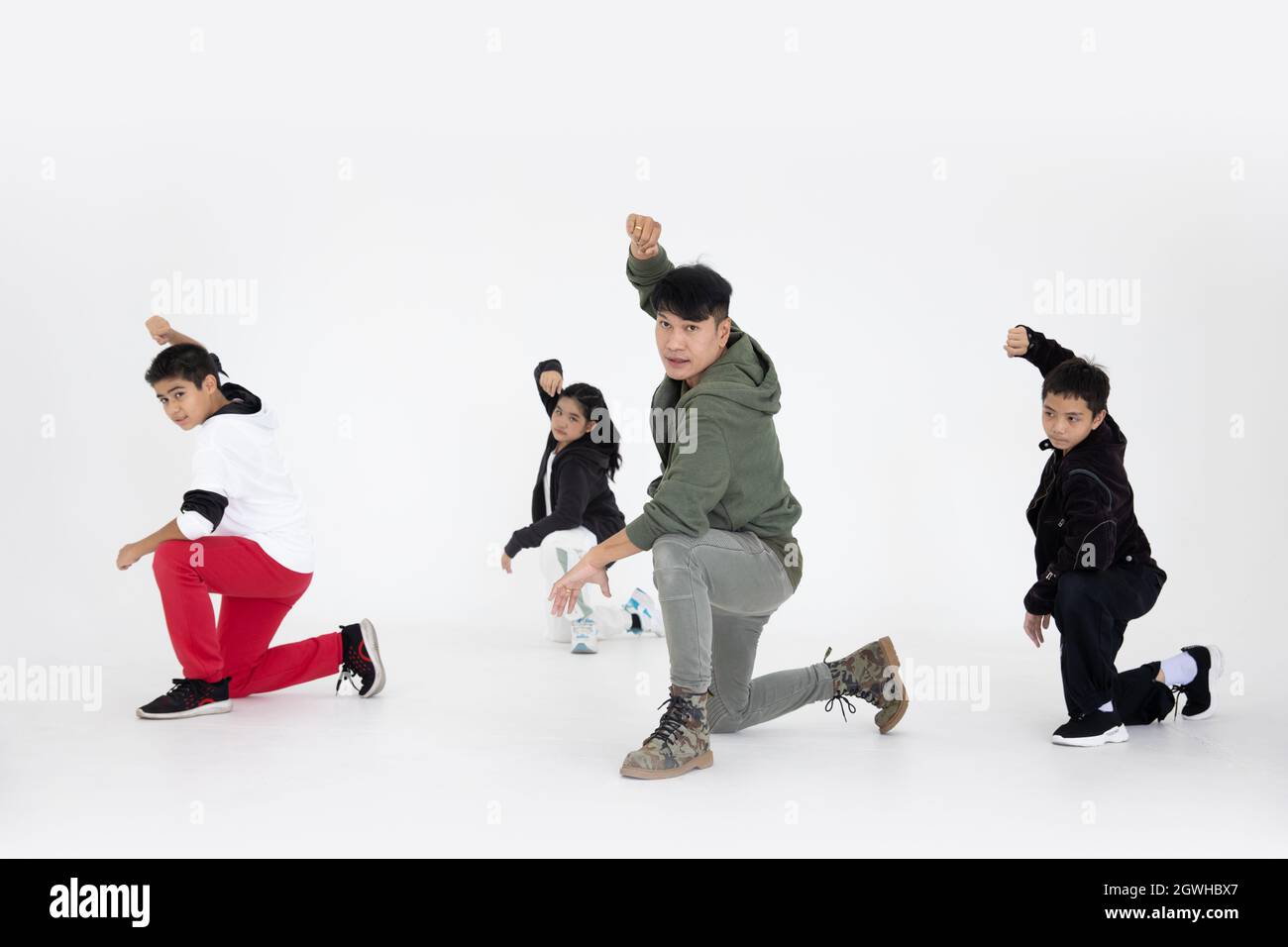 Group of Kid team activity dancing class with teacher lead action in ...