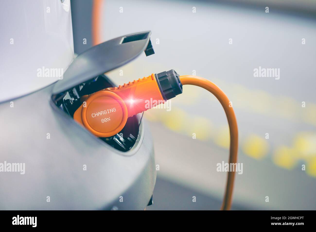 EV Car or Electric car at charging station with the power cable supply ...