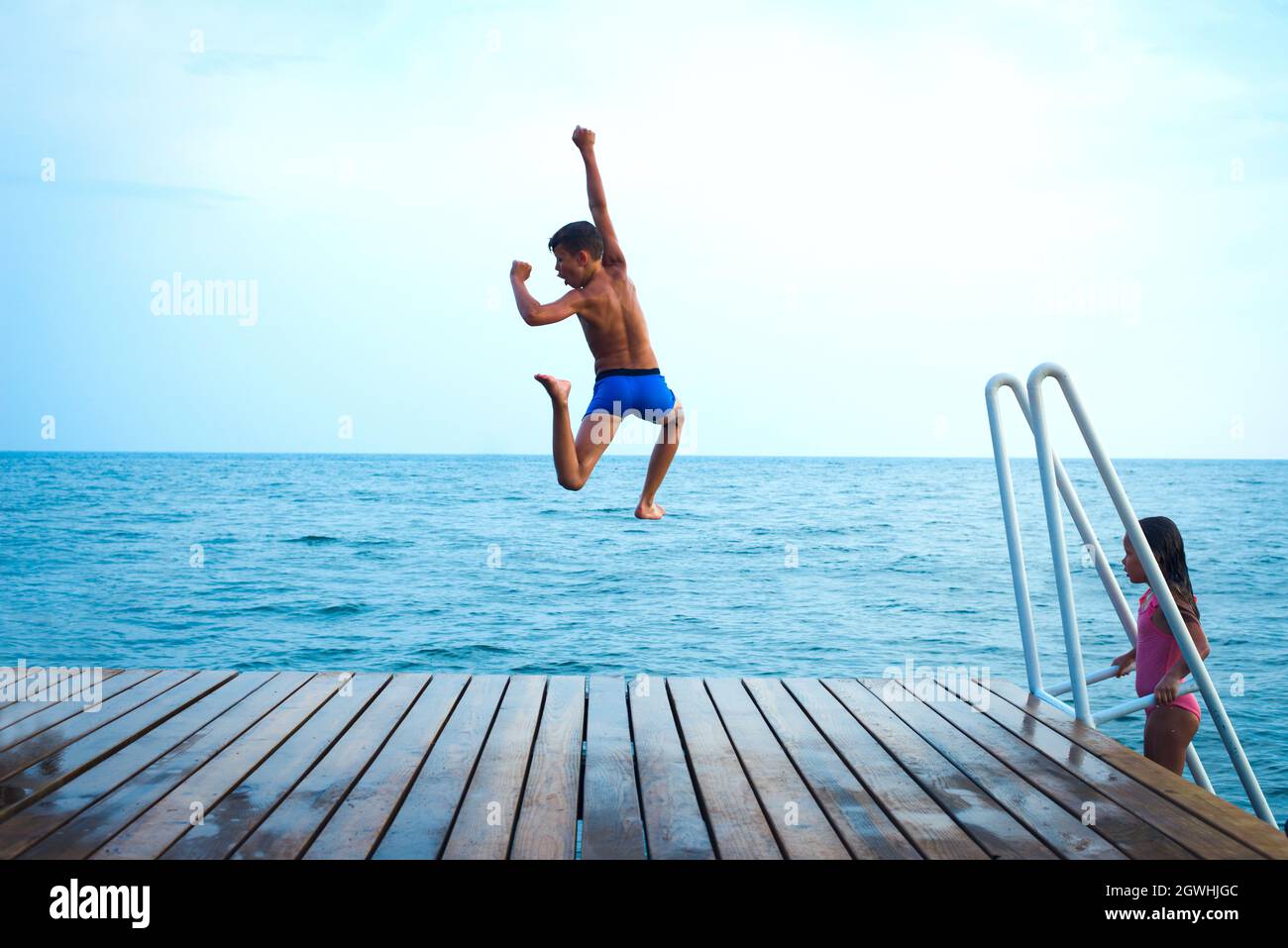 Jetty jump kids hi-res stock photography and images - Alamy