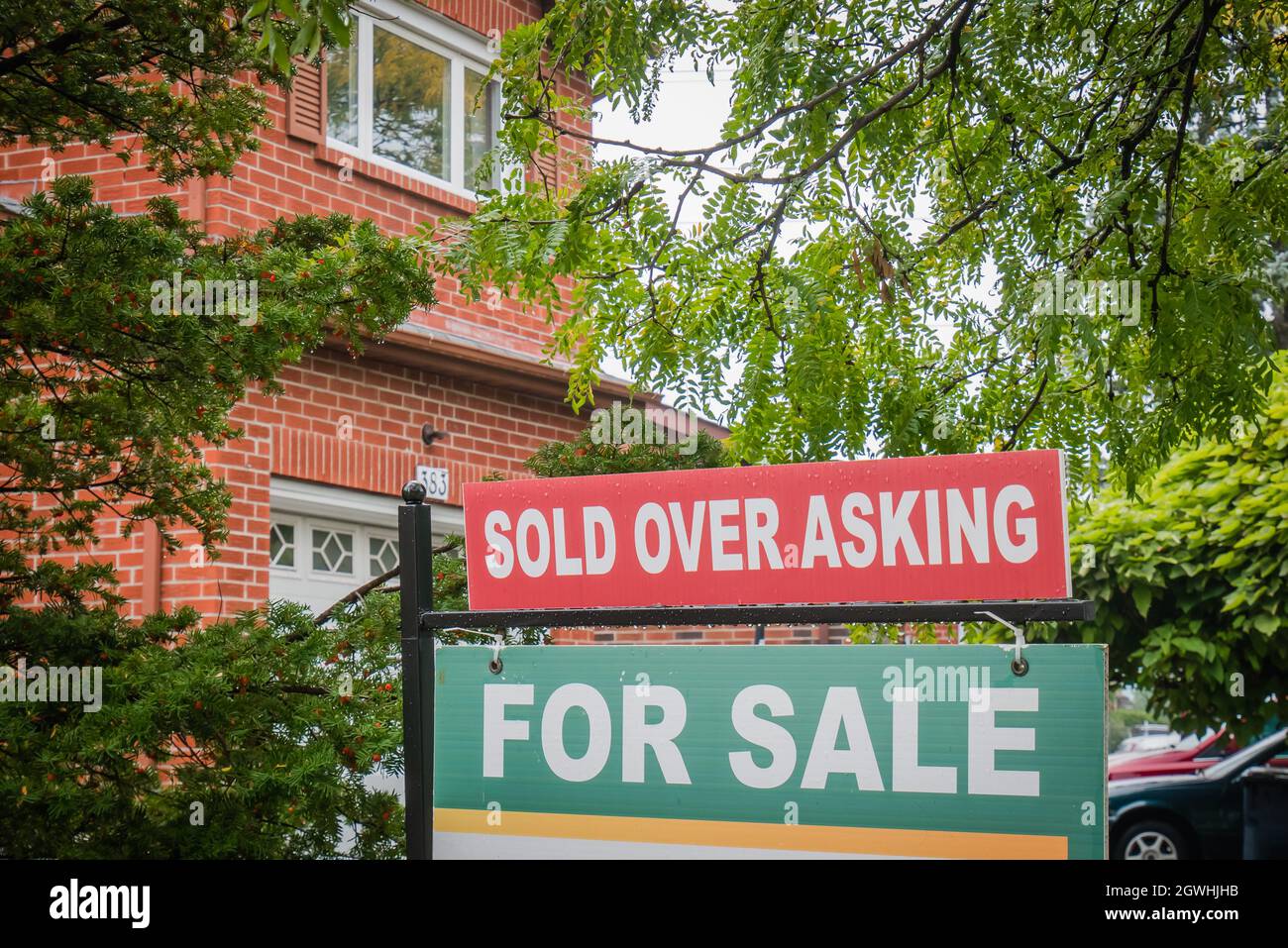 sold over asking price sign hot housing market Stock Photo - Alamy