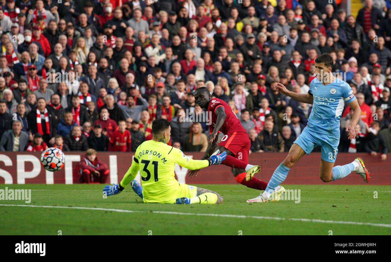 Liverpool's Sadio Mane scores their side's first goal of the game ...