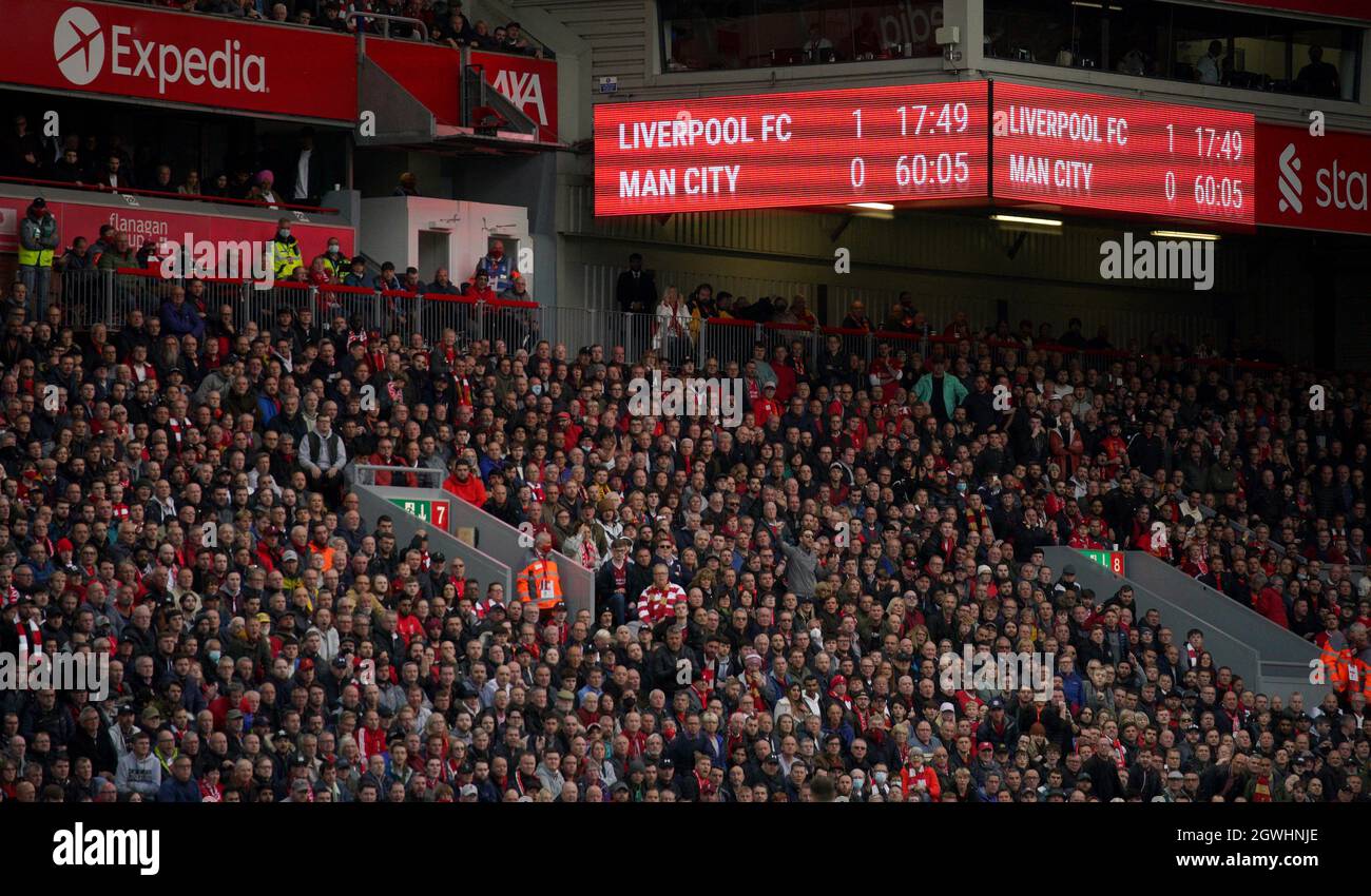 A view of a scoreboard above a section of Liverpool fans during the ...