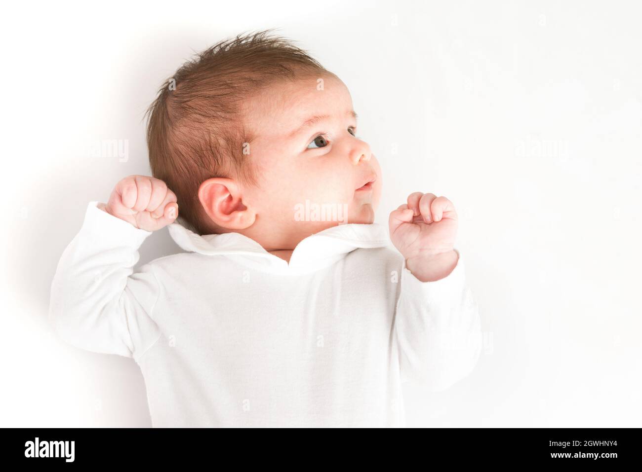 Baby lying sideways arm hi-res stock photography and images - Alamy
