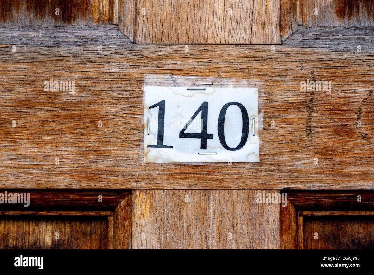 House Number 140 On A Wooden Front Door Stock Photo - Alamy