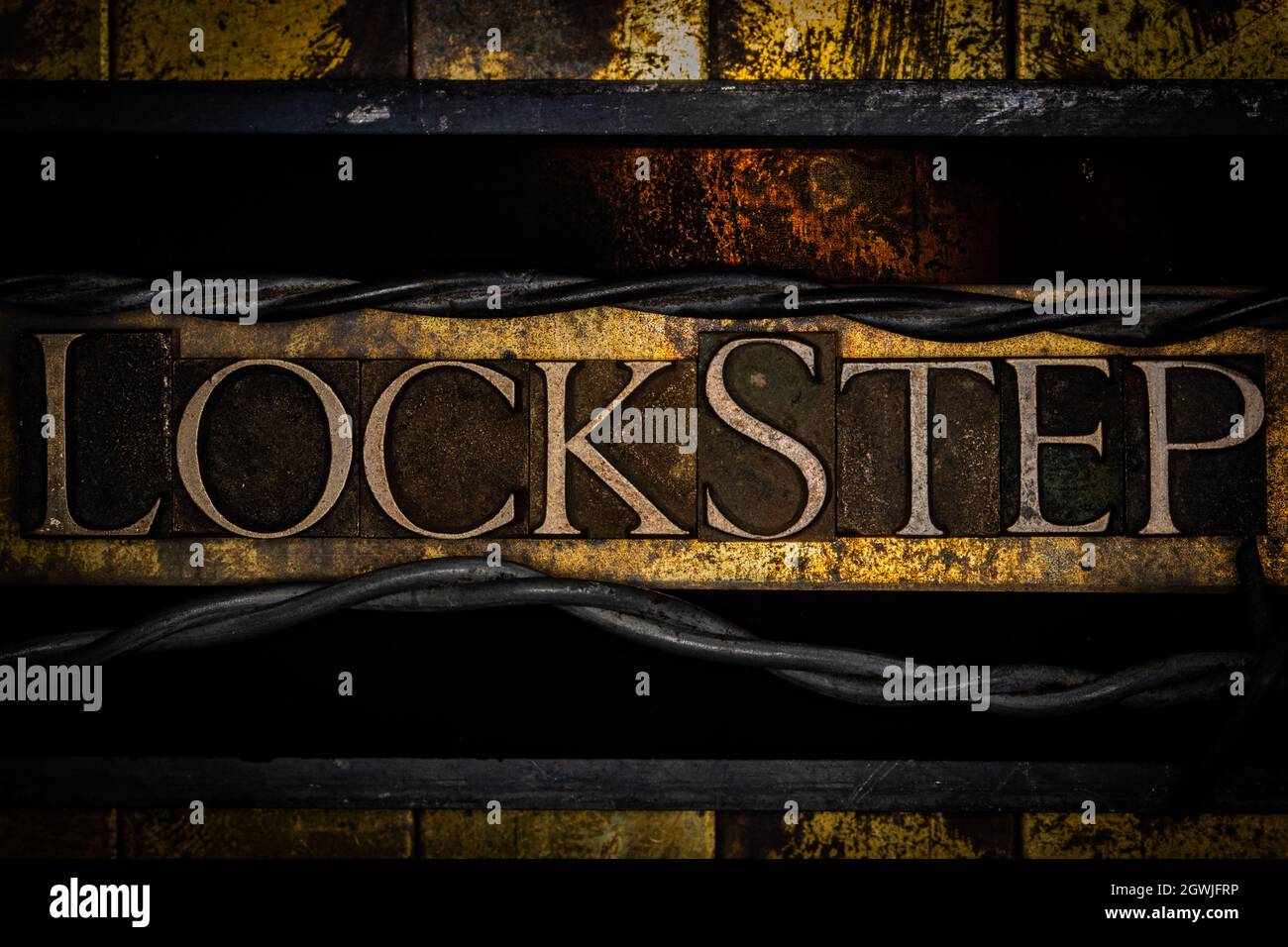 Lockstep text on textured grunge copper and vintage gold background ...