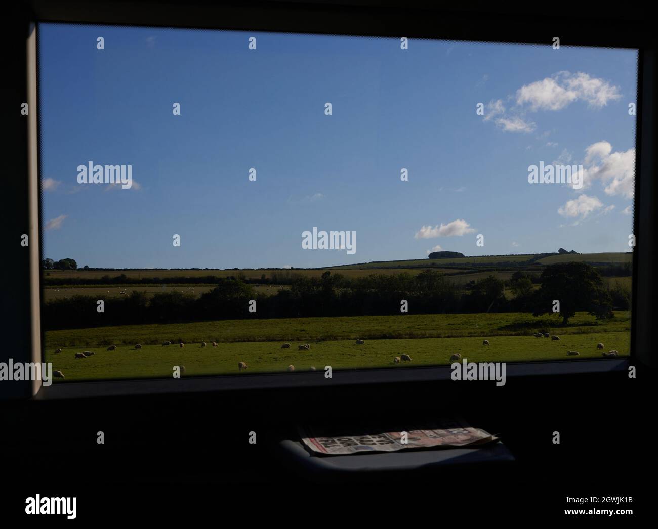 View of English countryside through a window of a train in the uk Stock ...