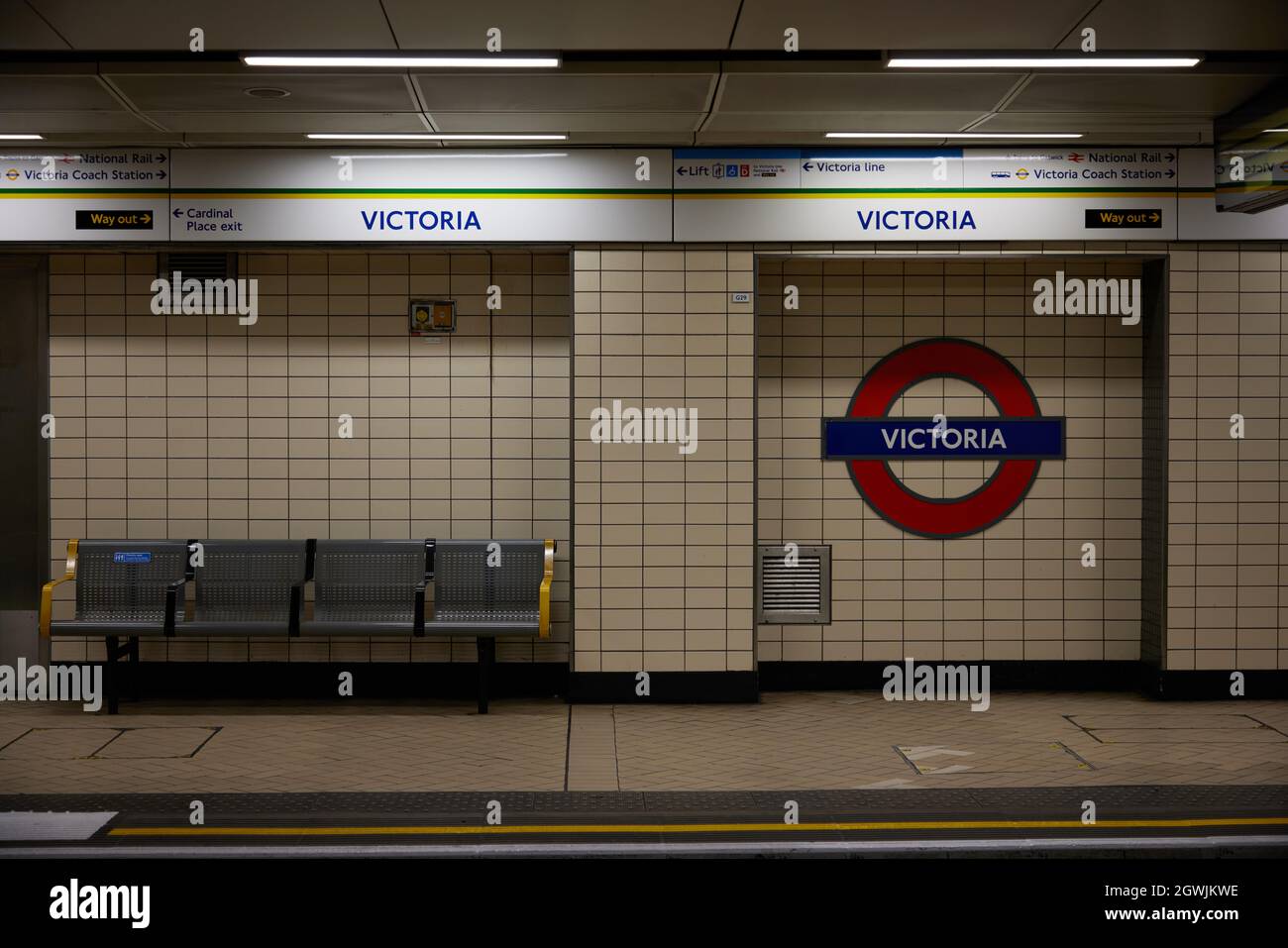 Interior view of a platform and the logo of Victoria Station Stock ...
