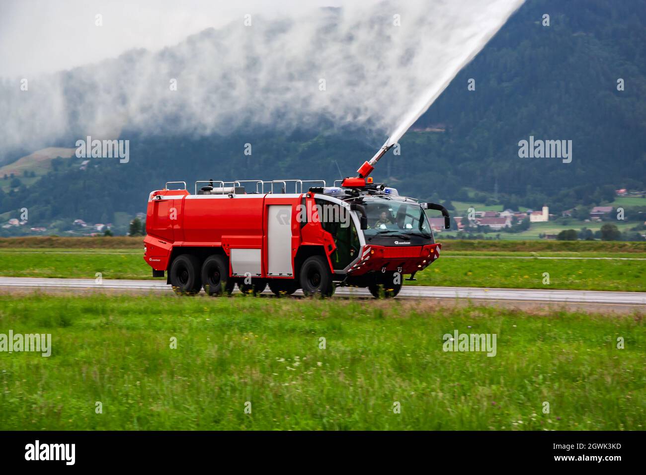 Zeltweg, Austria - June 28, 2013: Fire fighting with water spray. Fire ...