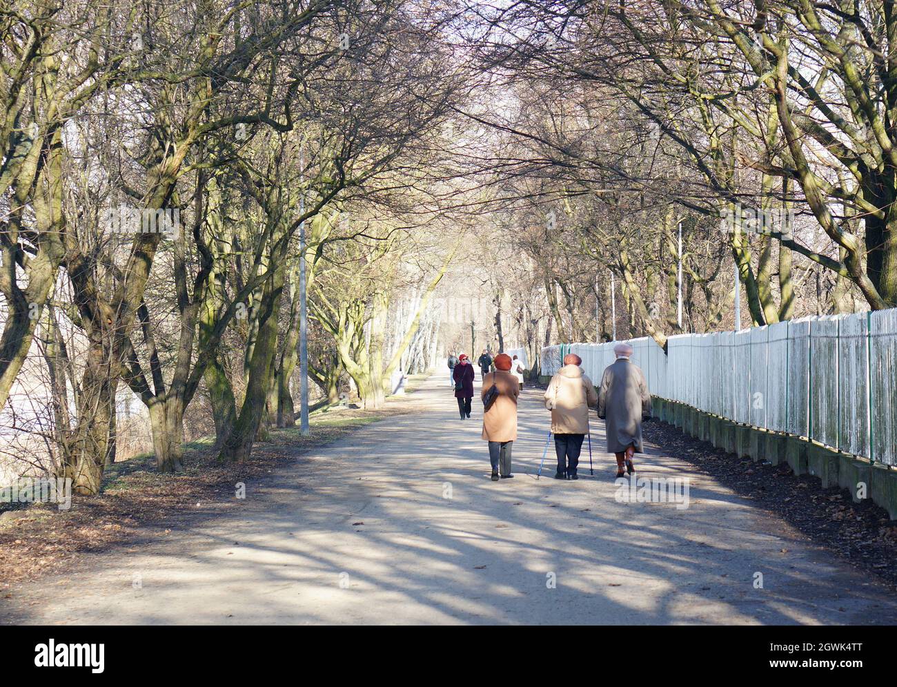 POZNAN, POLAND - Oct 27, 2014: A three older women walking on a ...