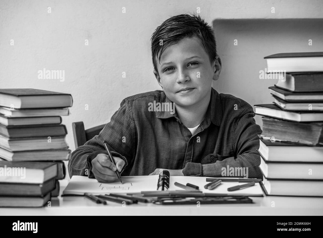 White teacher helping african boy hi-res stock photography and images ...