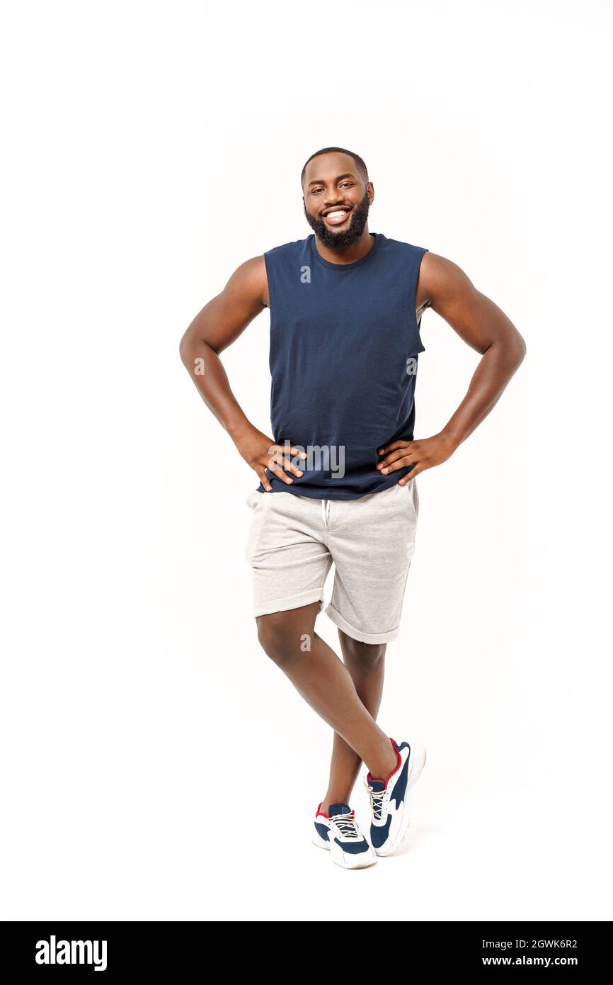 Young fitness african black man in sport wear cheering carefree ...