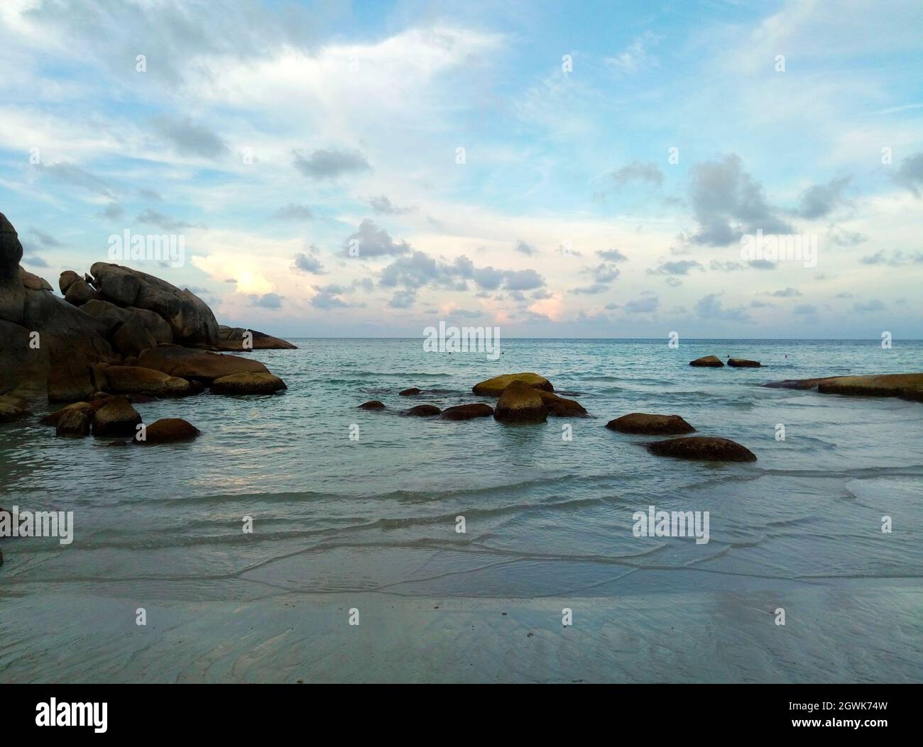 Evening sunset on the beach of a tropical island by the ocean Stock ...