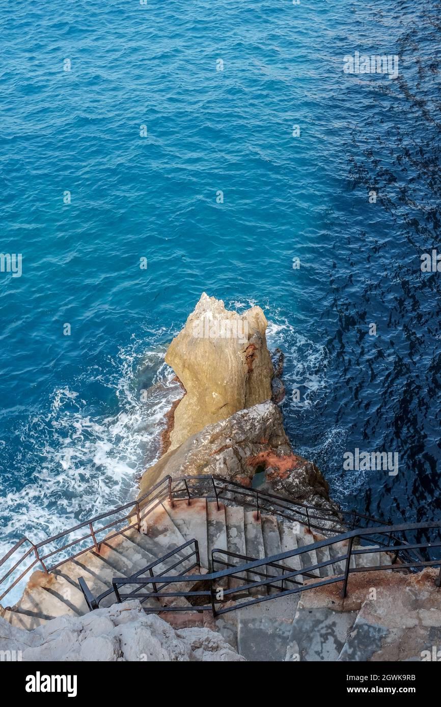 A close up shot from the top view of a beautiful stone building with ...