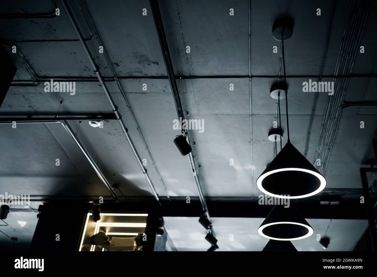 hanging lamps in the loft style . Cold light Stock Photo - Alamy