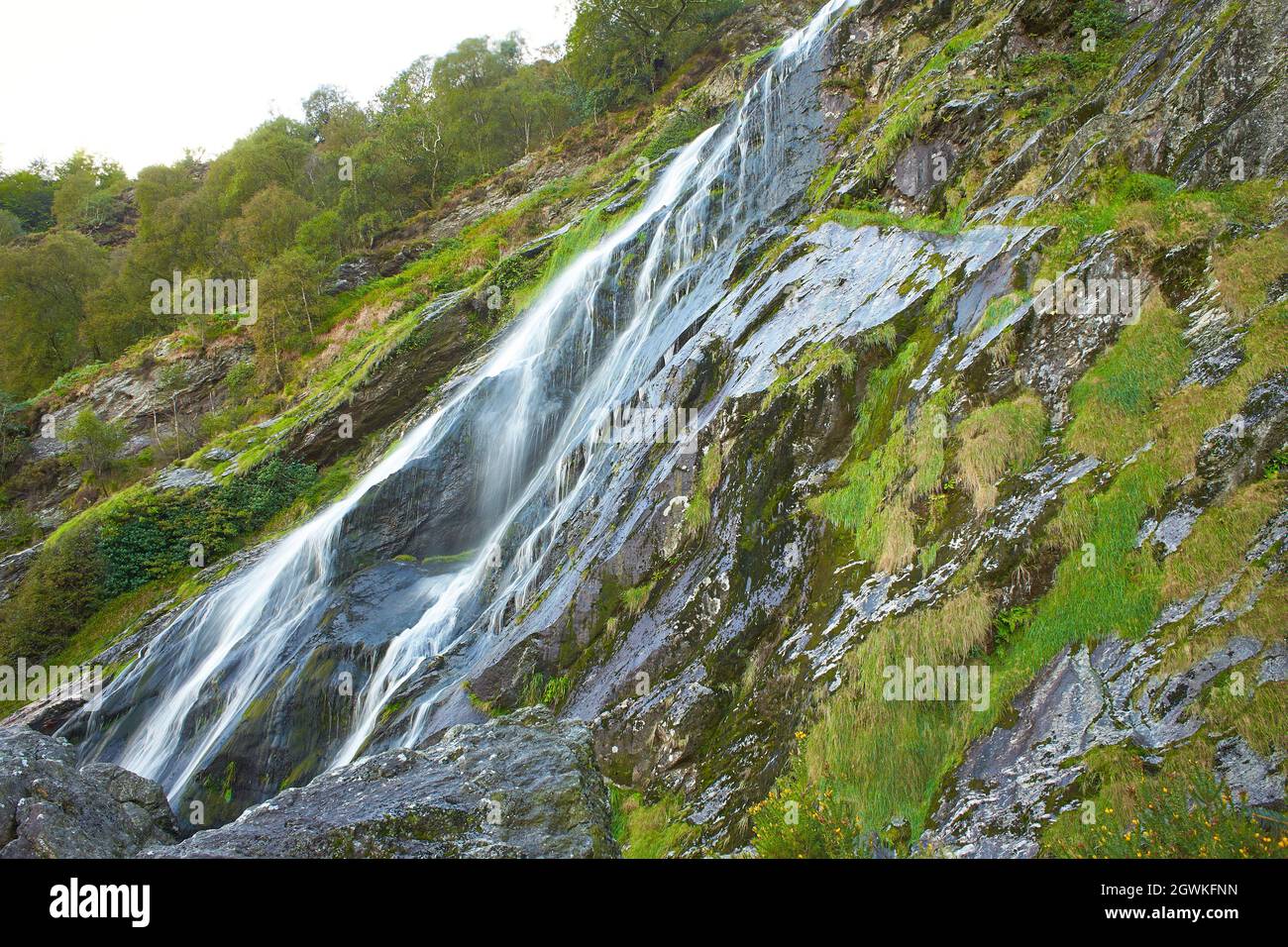 Majestic water cascade of Powerscourt Waterfall, the highest waterfall ...