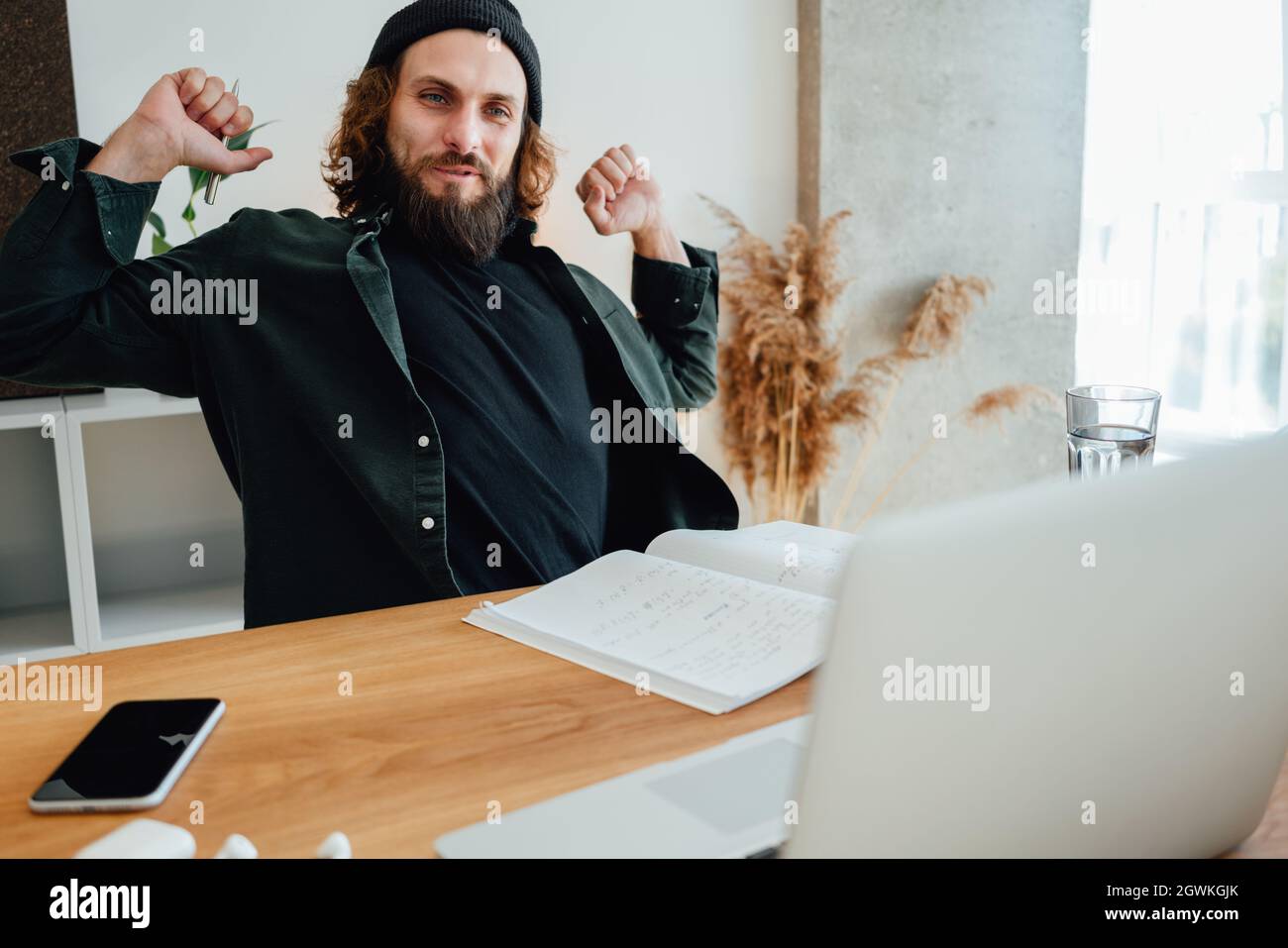 Student hipster stretch oneself after hard work education while study ...