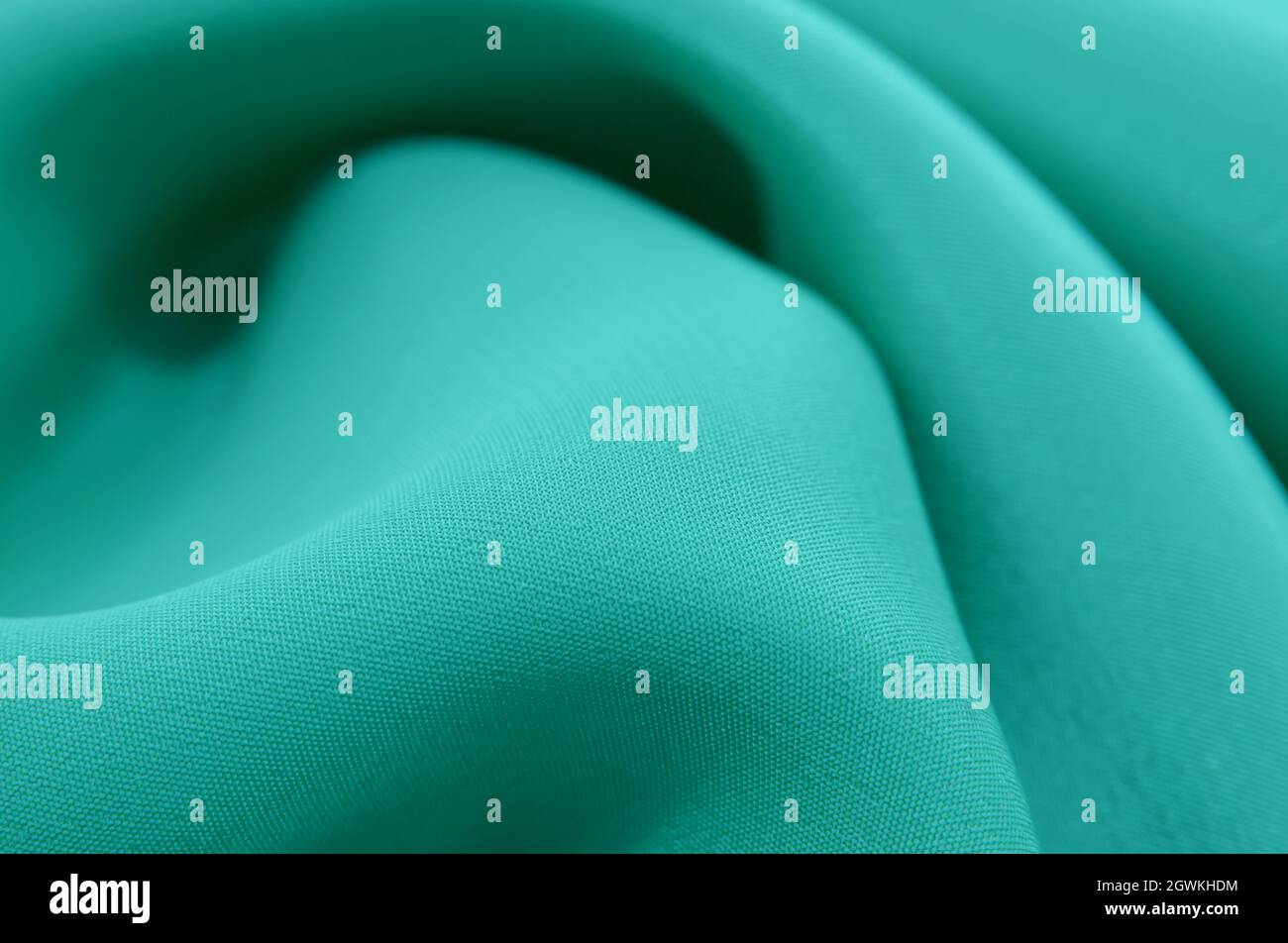 A piece of turquoise,aquamarine, blue. cloth. Fabric texture for ...