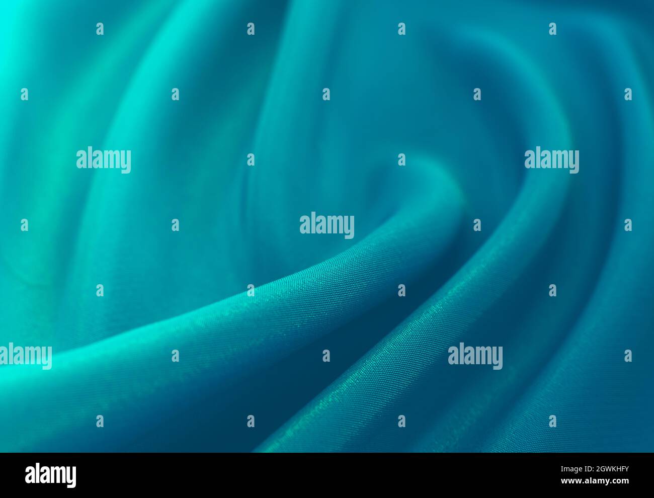 A piece of turquoise,aquamarine, blue. cloth. Fabric texture for ...