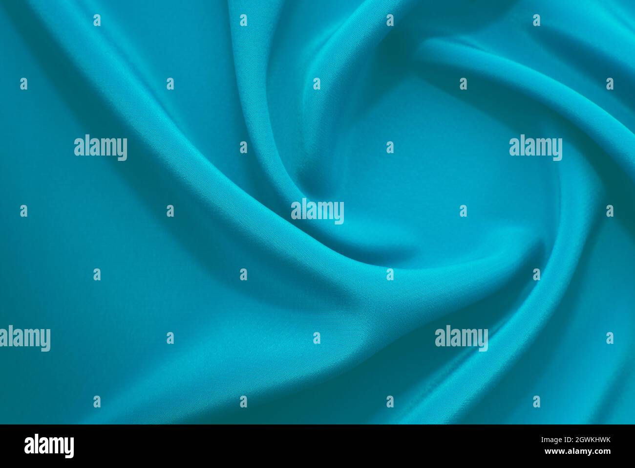 A piece of turquoise,aquamarine, blue. cloth. Fabric texture for ...