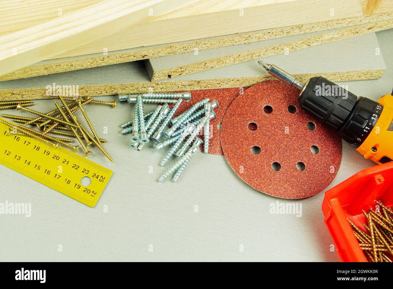 tools for repair and construction. Screwdriver, furniture screws ...