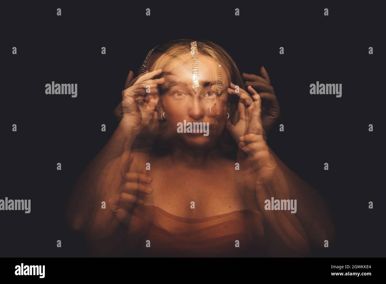 Many-faced girl, symbol of Indian mythology Stock Photo - Alamy