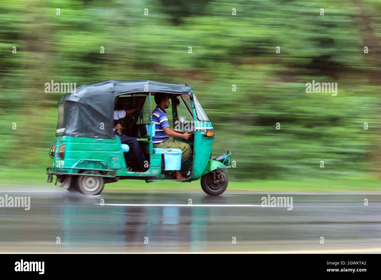 Auto rickshaw on road High Resolution Stock Photography and Images - Alamy