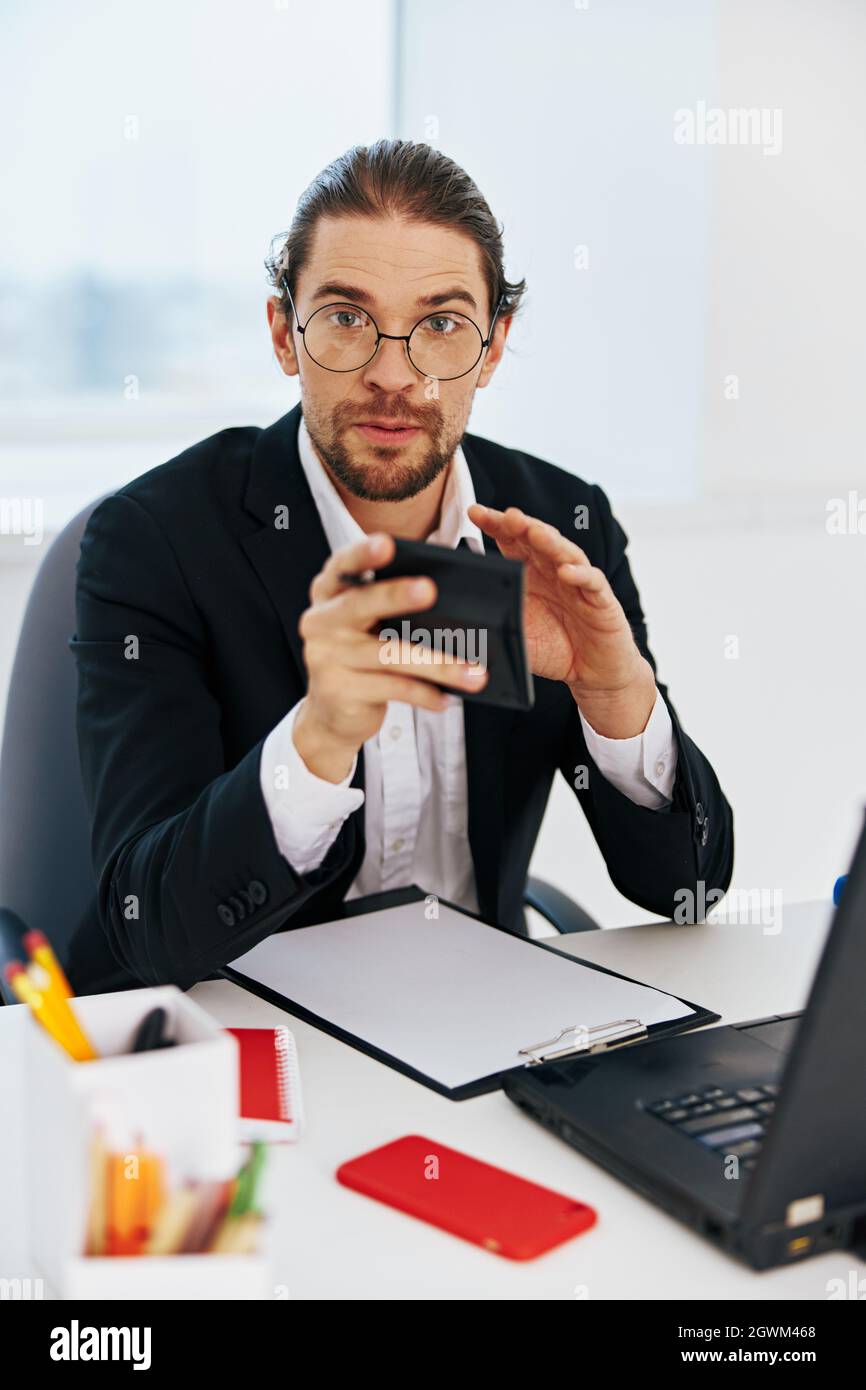manager documents work office laptop lifestyle Stock Photo - Alamy