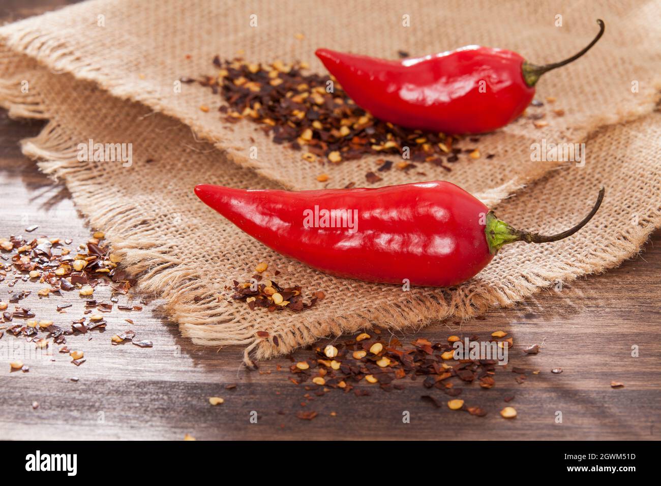 Crushed red cayenne pepper, dried chili and seeds Stock Photo - Alamy